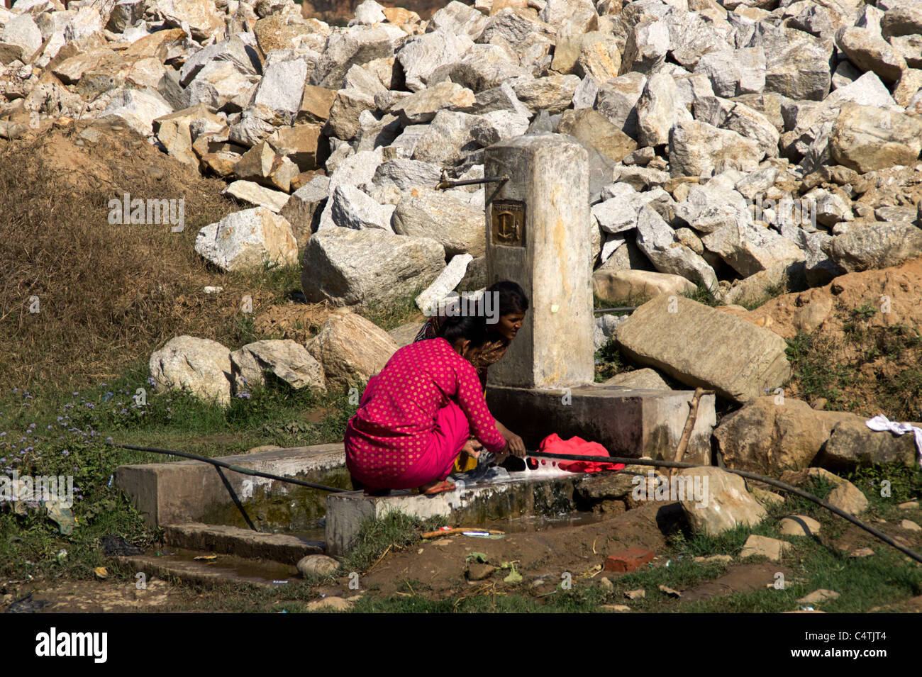 Nepal kathmandu woman washing clothes hi-res stock photography and ...