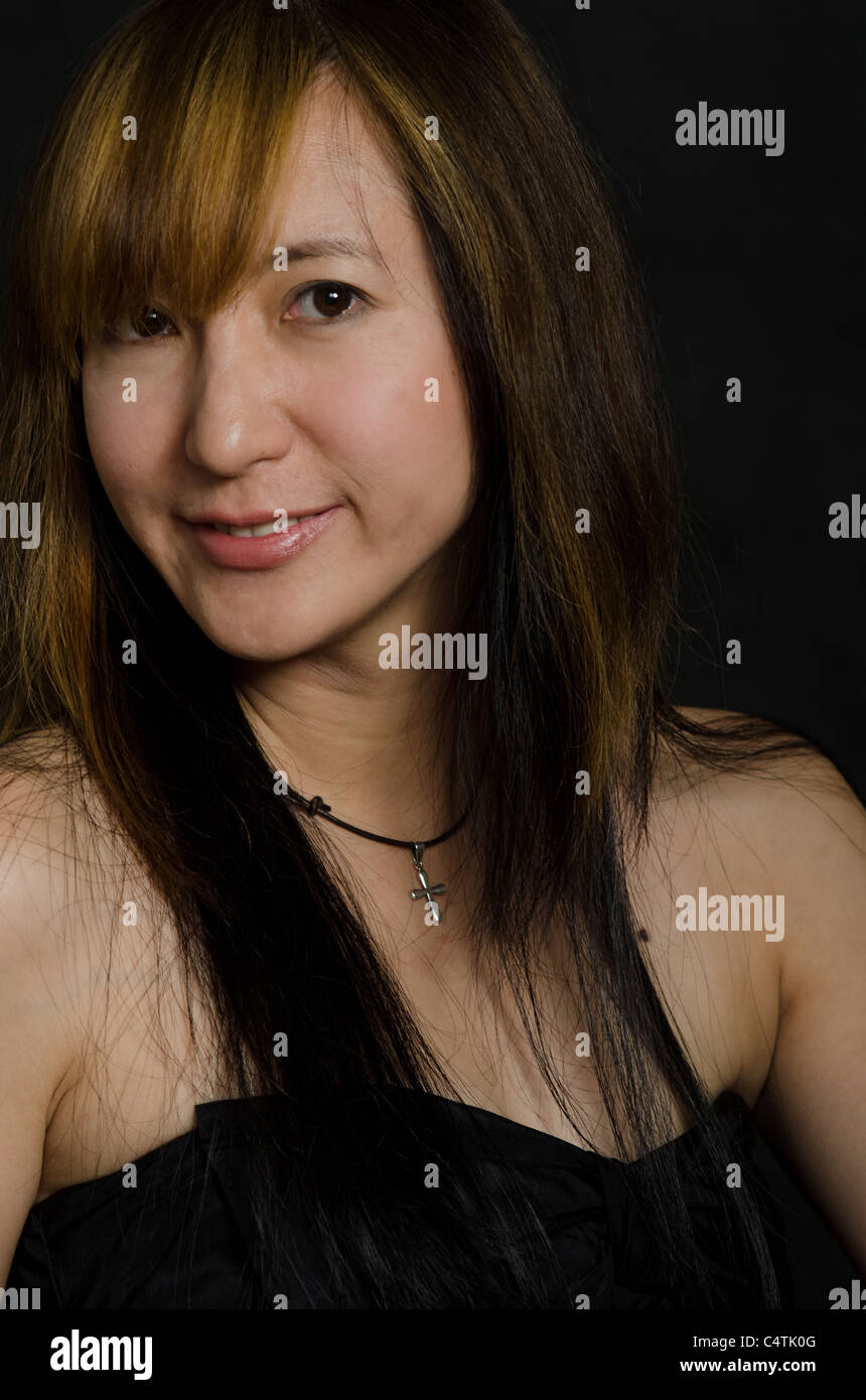 Attractive chinese forties woman Stock Photo - Alamy