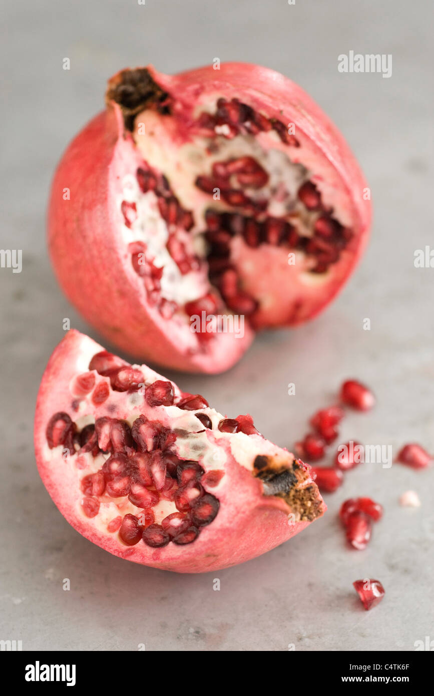 Pomegranate cut open Stock Photo - Alamy