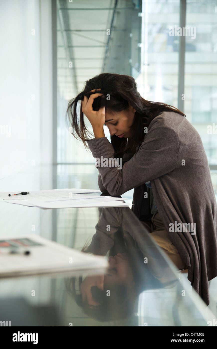 Businesswoman stressing over work Stock Photo - Alamy