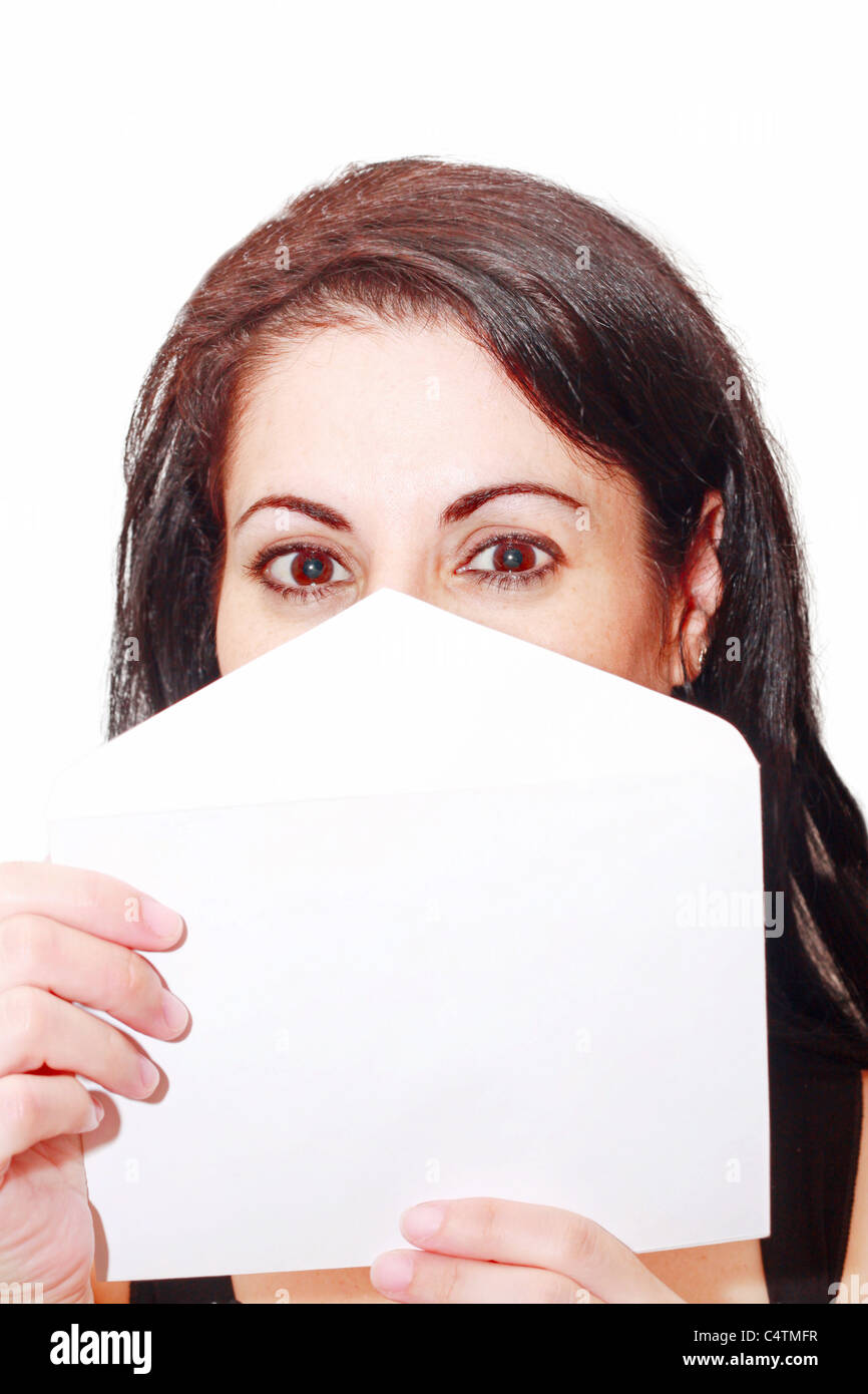 Beautiful woman covering her face with a letter isolated Stock Photo ...
