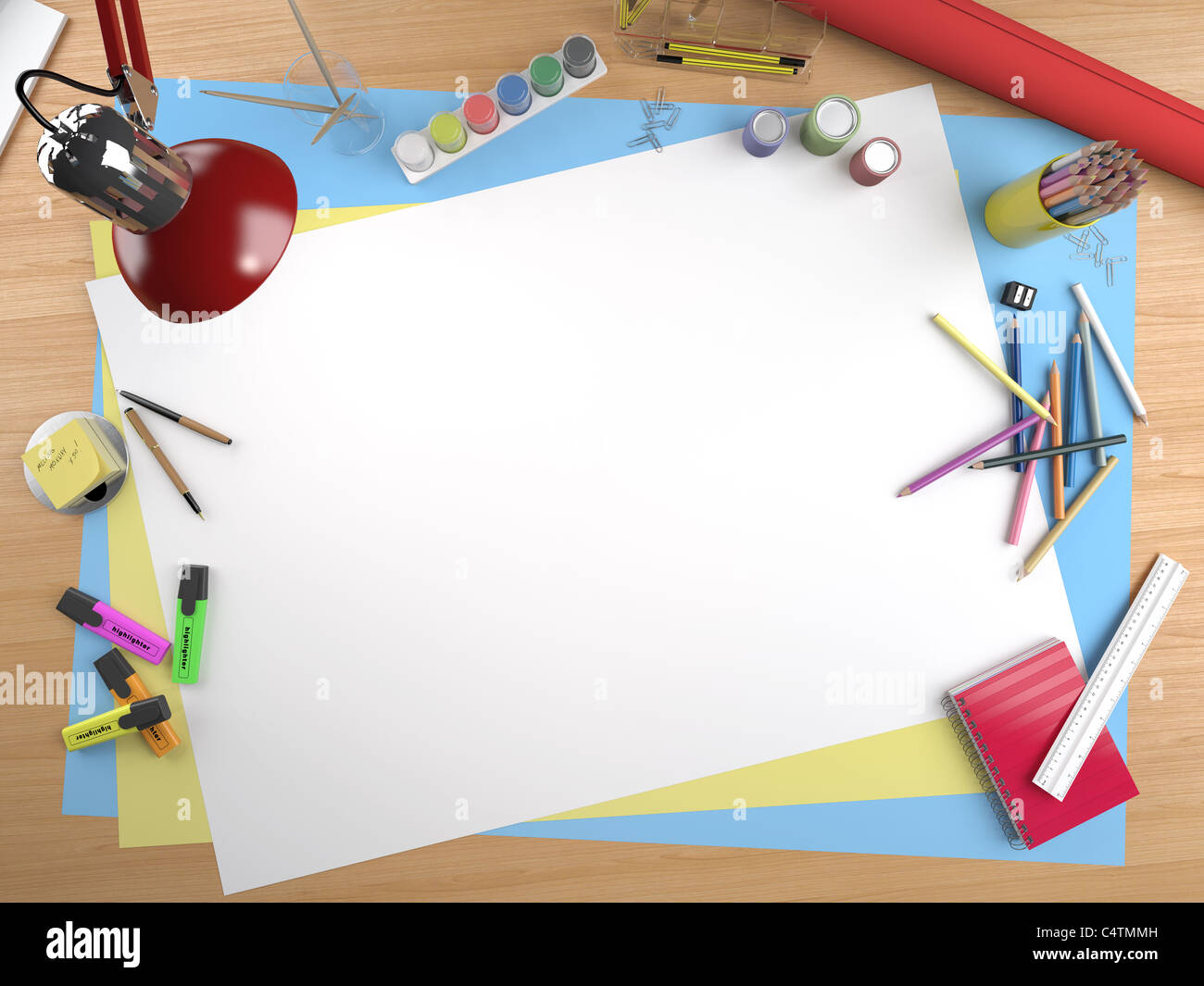 white canvas on a drawing table with lots of stationery objects making ...