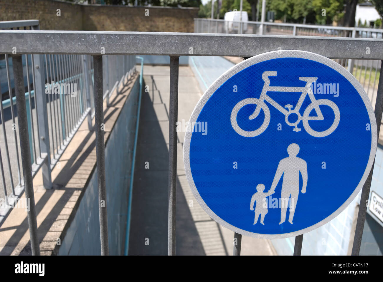 sign indicating a path shared by pedestrians and cyclists, on the ...