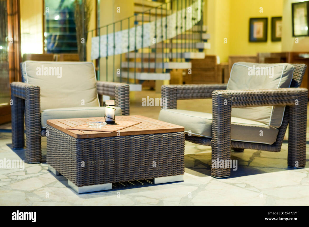Chairs and coffee table at hotel lobby Stock Photo - Alamy
