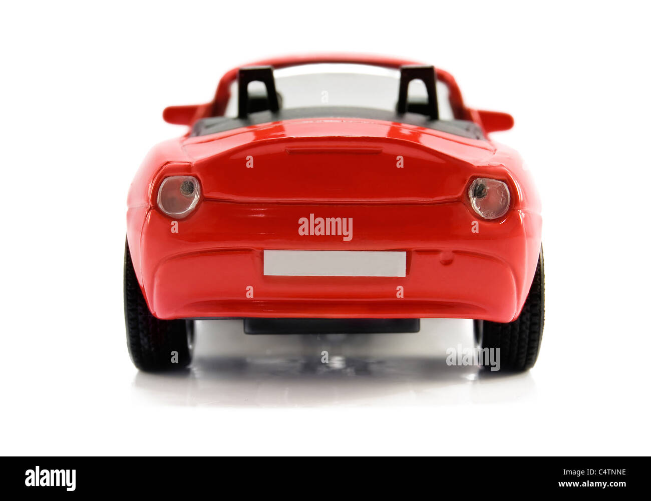 Red car on road Cut Out Stock Images & Pictures - Alamy