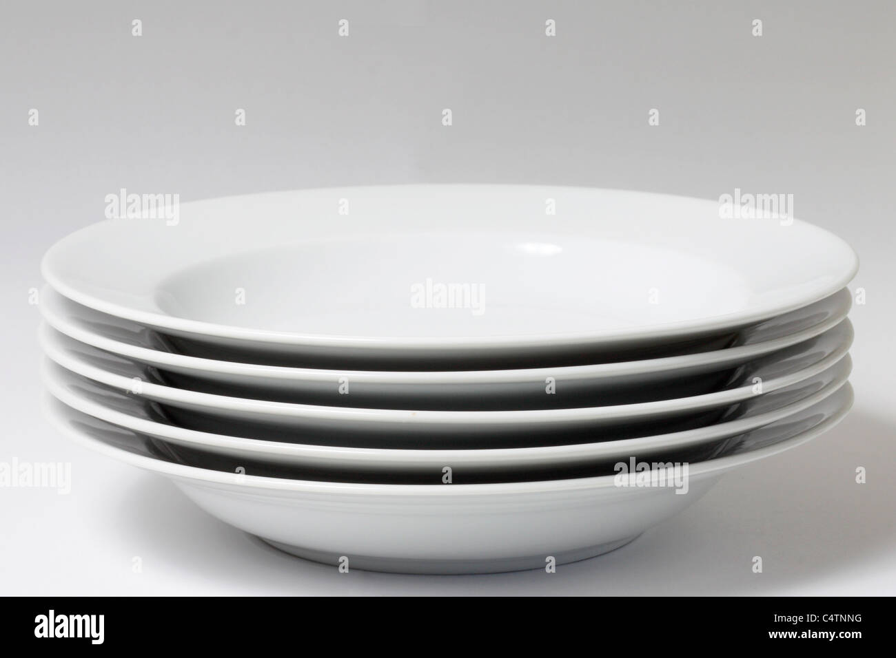 Stacked plates hi-res stock photography and images - Alamy