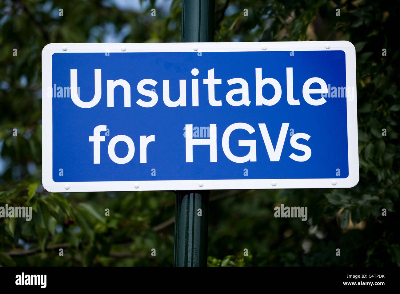 Sign warning that the road ahead is unsuitable for heavy vehicles. UK ...