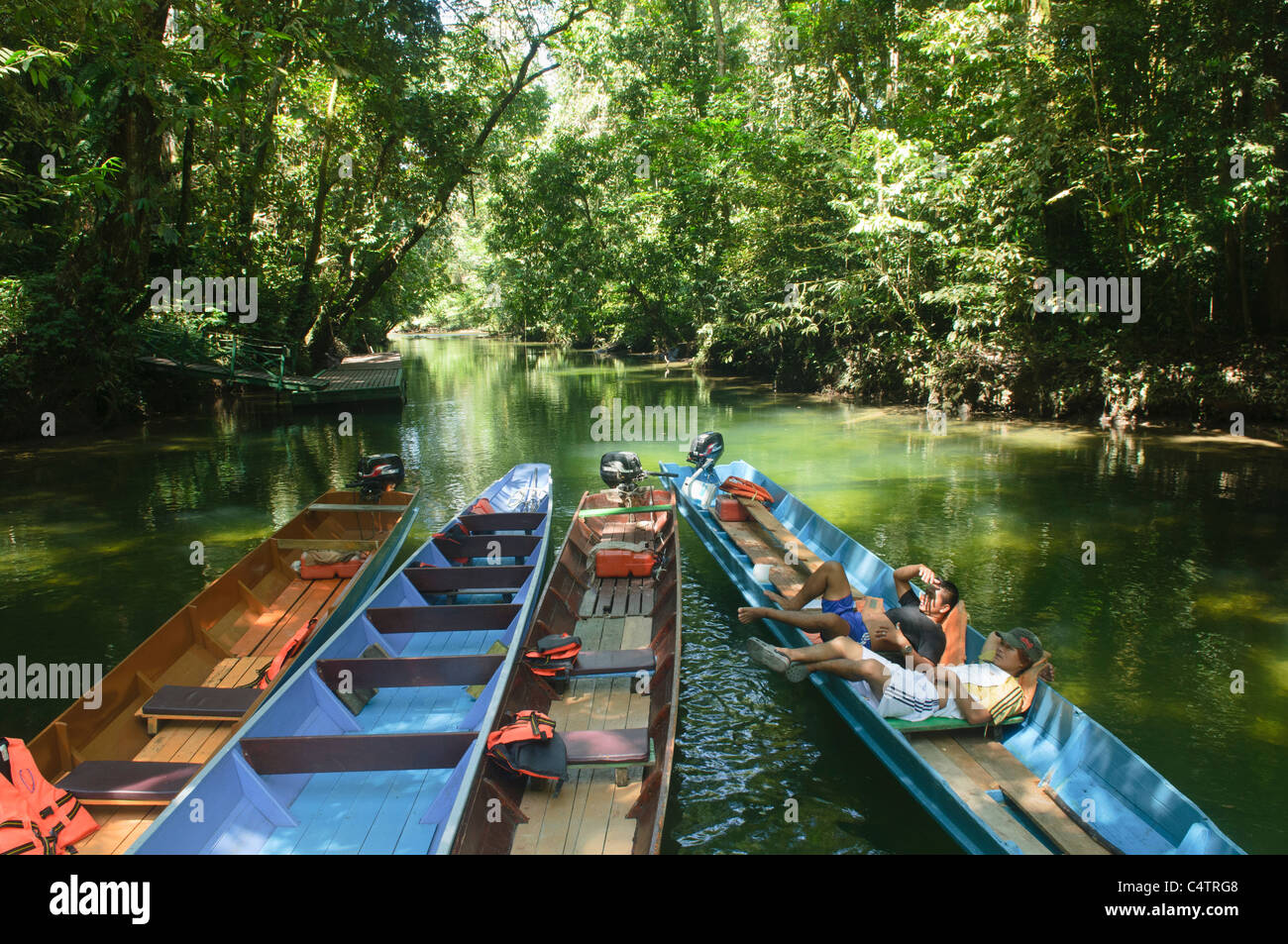 boats and beautiful jungle pool in Mulu National Park in Sarawak ...