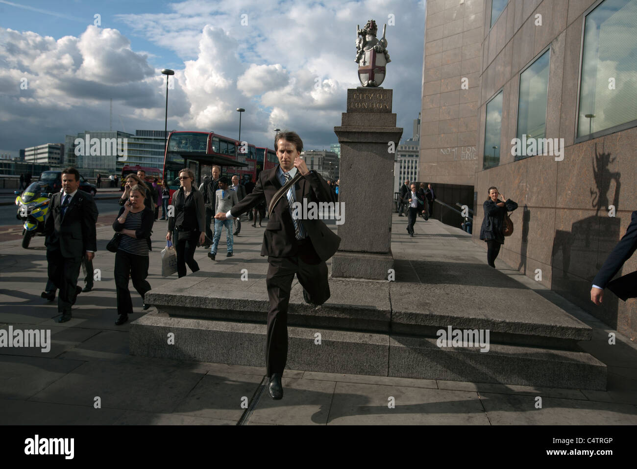 city of london commuters heading for london bridge station Stock Photo ...