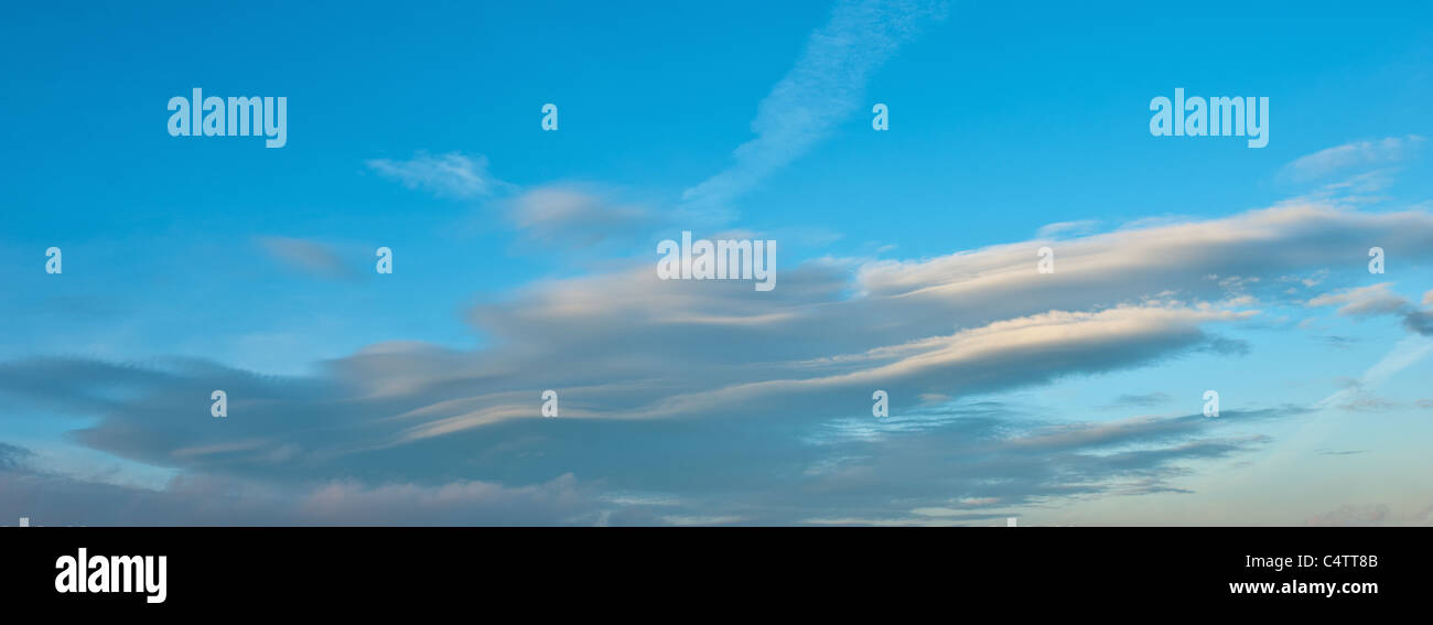 amazing arcus cloud formation against blue sky Stock Photo - Alamy