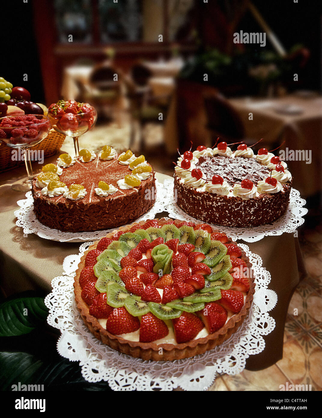 THREE CAKES IN RESTAURANT Stock Photo - Alamy