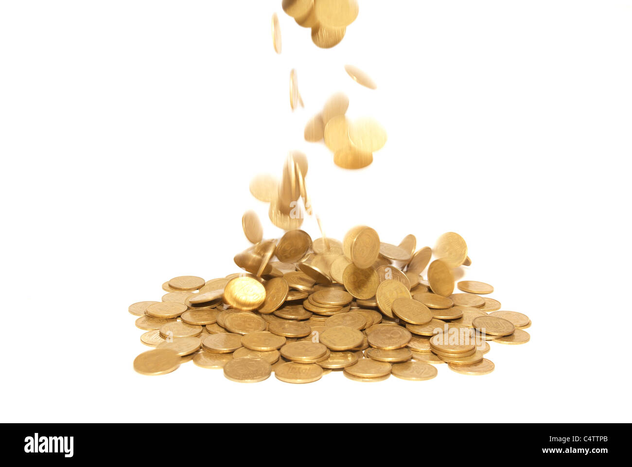 Rain of golden coins Stock Photo - Alamy