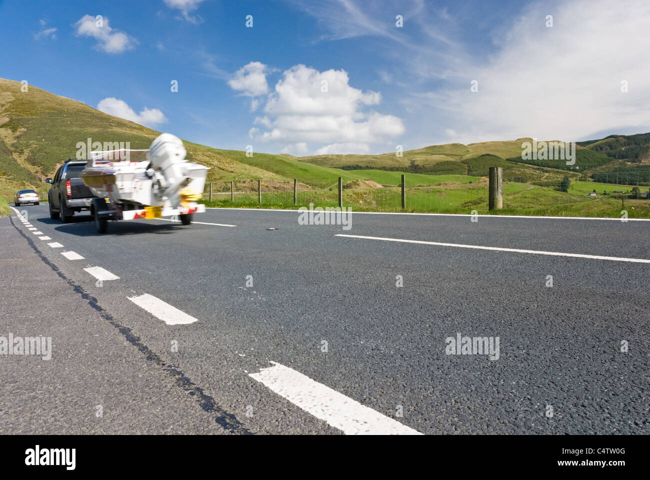 Car towing boat hi-res stock photography and images - Alamy