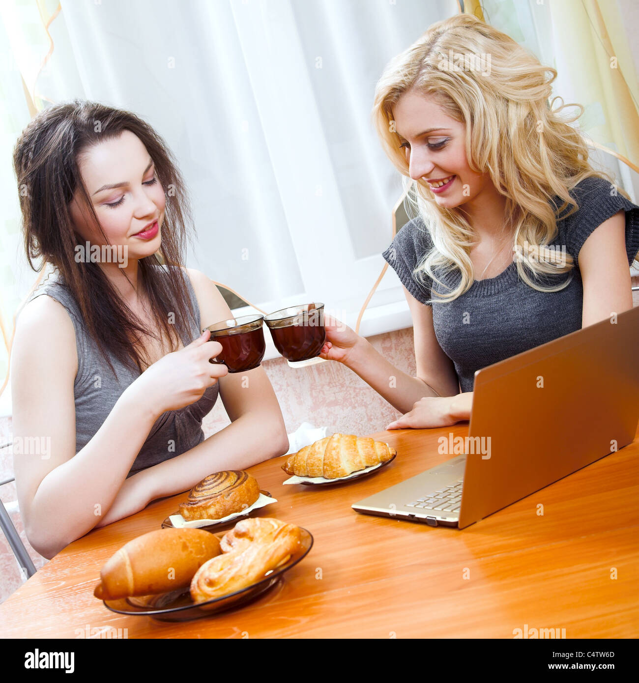 girls at the table Stock Photo - Alamy