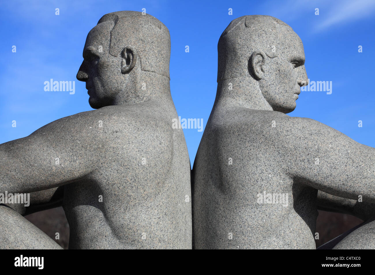 Sculpture of two men sitting back to back in Olso's Vigeland Park Stock ...