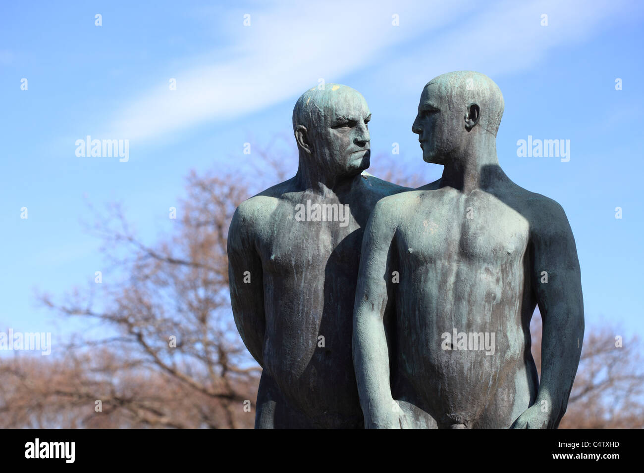 Sculpture of two men looking at each other in Oslo's Vigeland Park ...