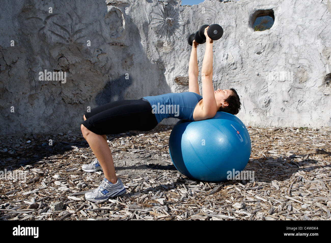 young woman working out outdoors Stock Photo - Alamy