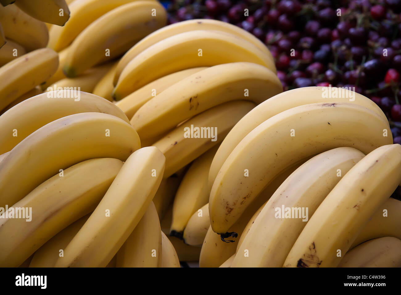 Bunch of ripe yellow bananas on counter Stock Photo - Alamy