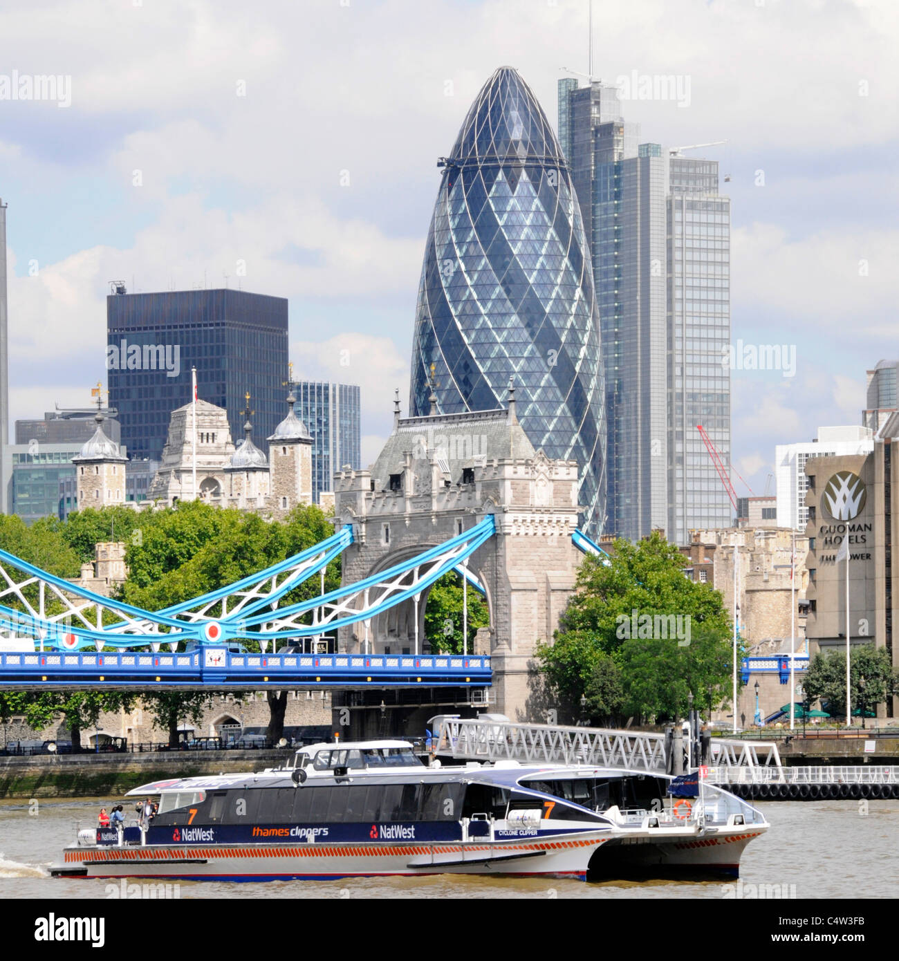 Thames clipper boat public transport service River Thames with City of ...