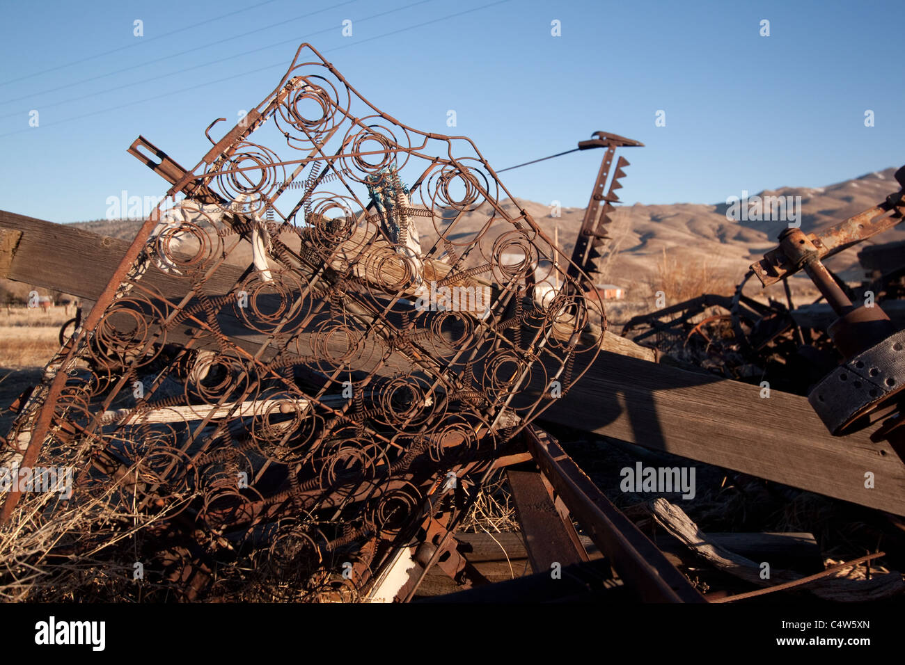 old junk in a field Stock Photo - Alamy