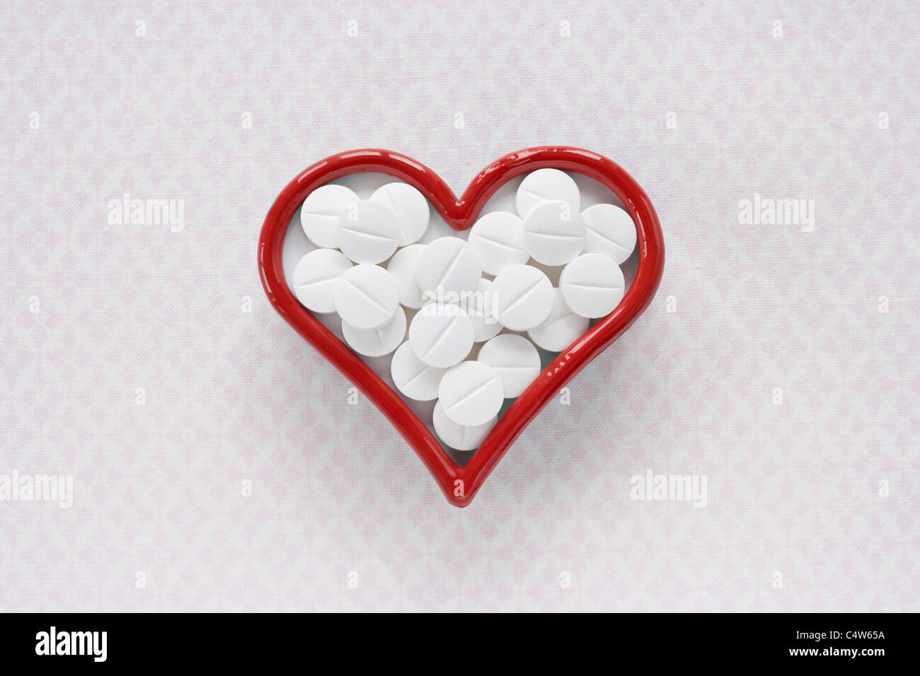 Heart Shape filled with Pills Stock Photo - Alamy