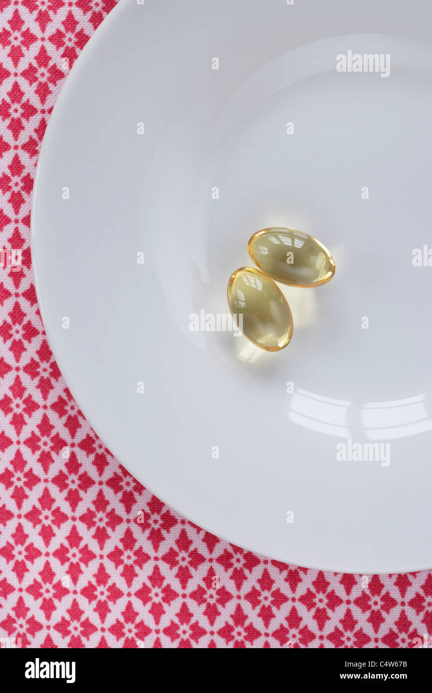 Capsules on Plate Stock Photo - Alamy