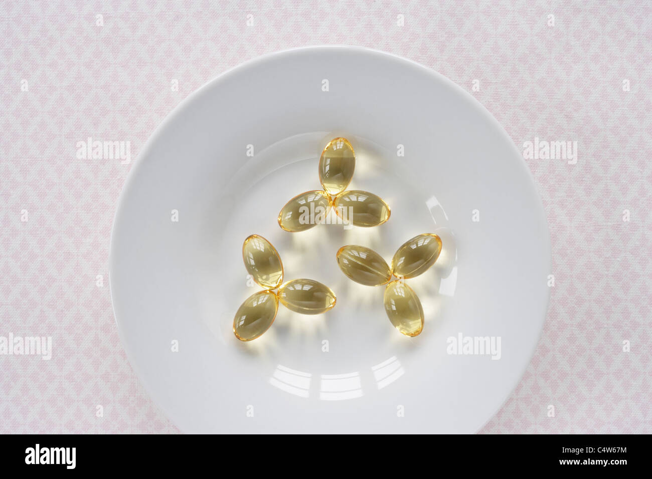 Capsules on Plate Stock Photo - Alamy