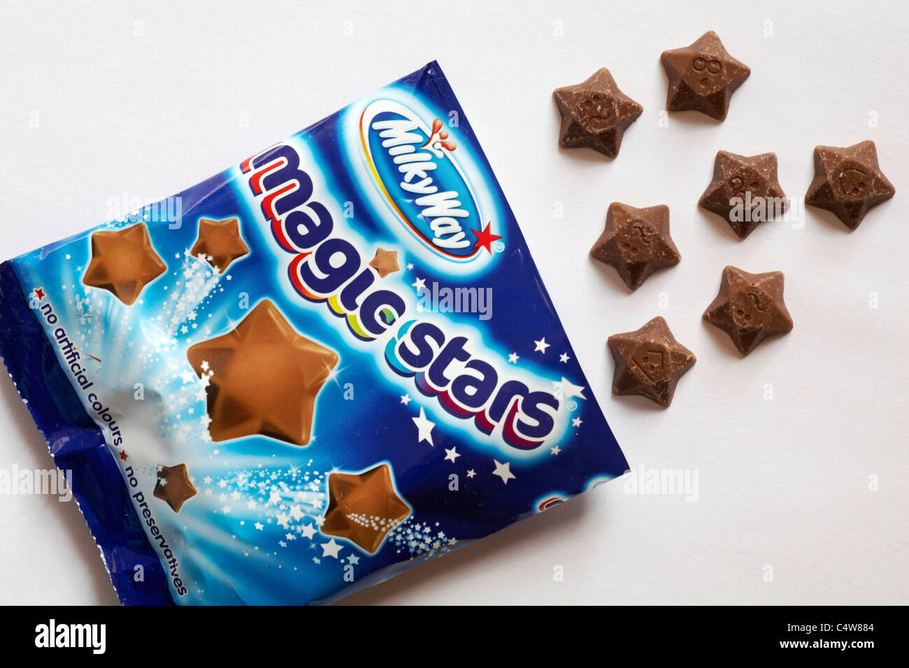 Packet of Milky Way magic stars chocolates with contents spilled spilt ...