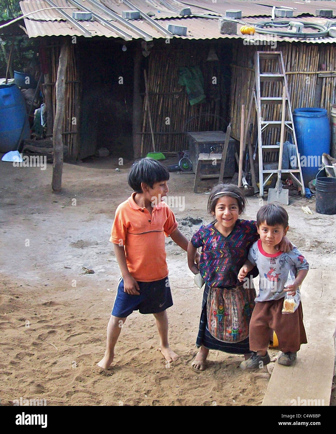 Poor Indian children in Guatemala who are having new homes built by ...