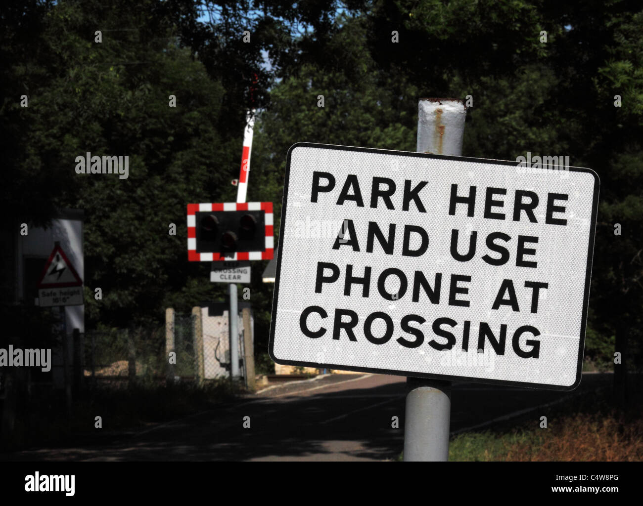 Level crossing with barrier sign hi-res stock photography and images ...