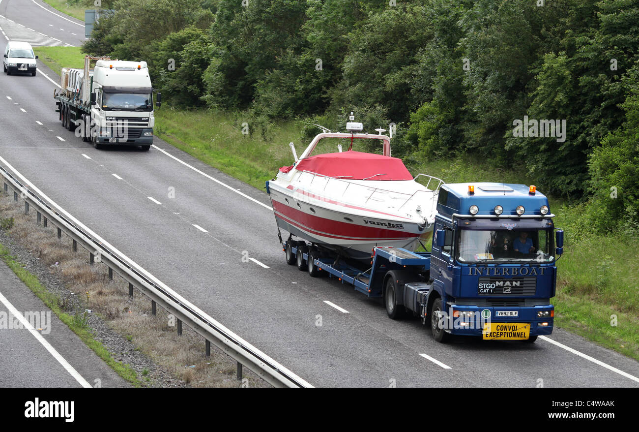 A speed boat is transported on a lorry. Picture by James Boardman Stock ...