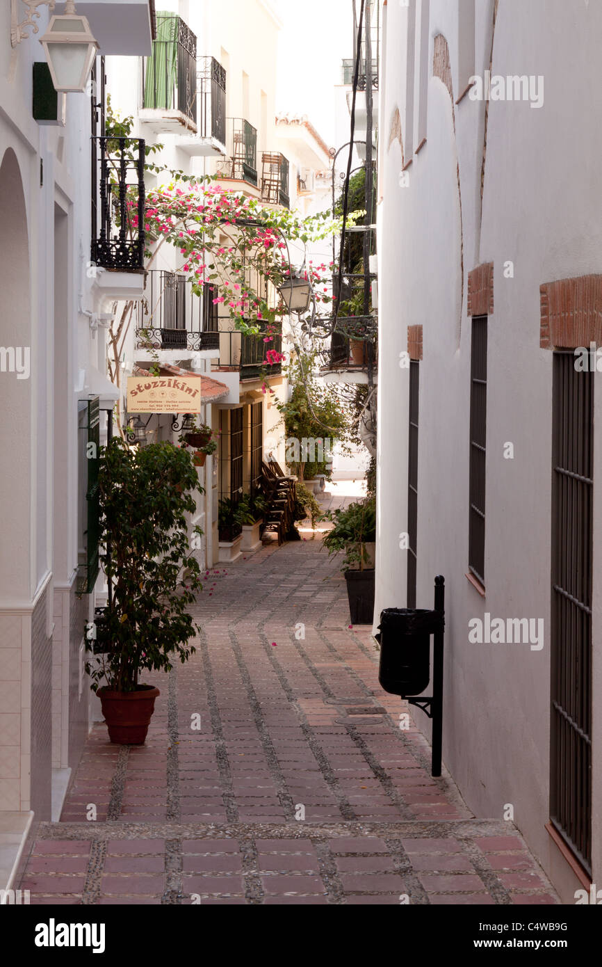Marbella old town street - typical Spanish whitewash buildings Stock ...