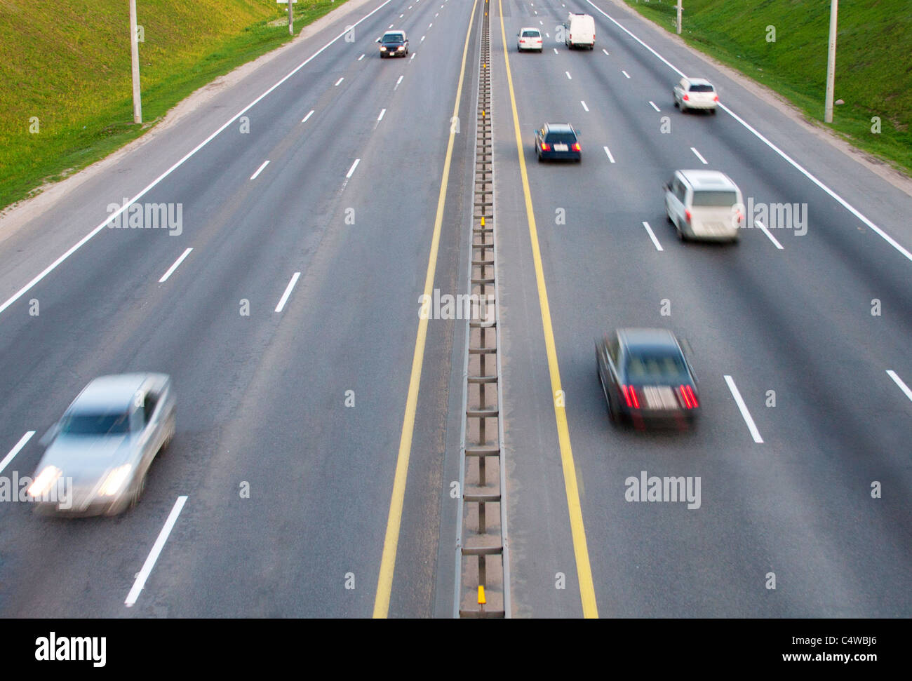 Cars on a road with motion blurred effect Stock Photo - Alamy