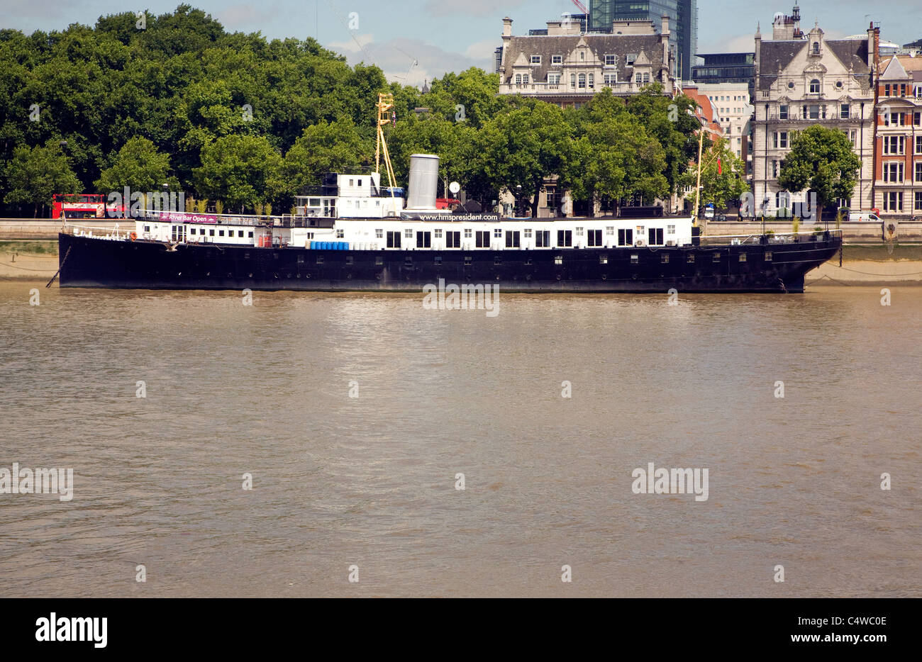 Looking across the River Thames to HMS President on the Embankment ...