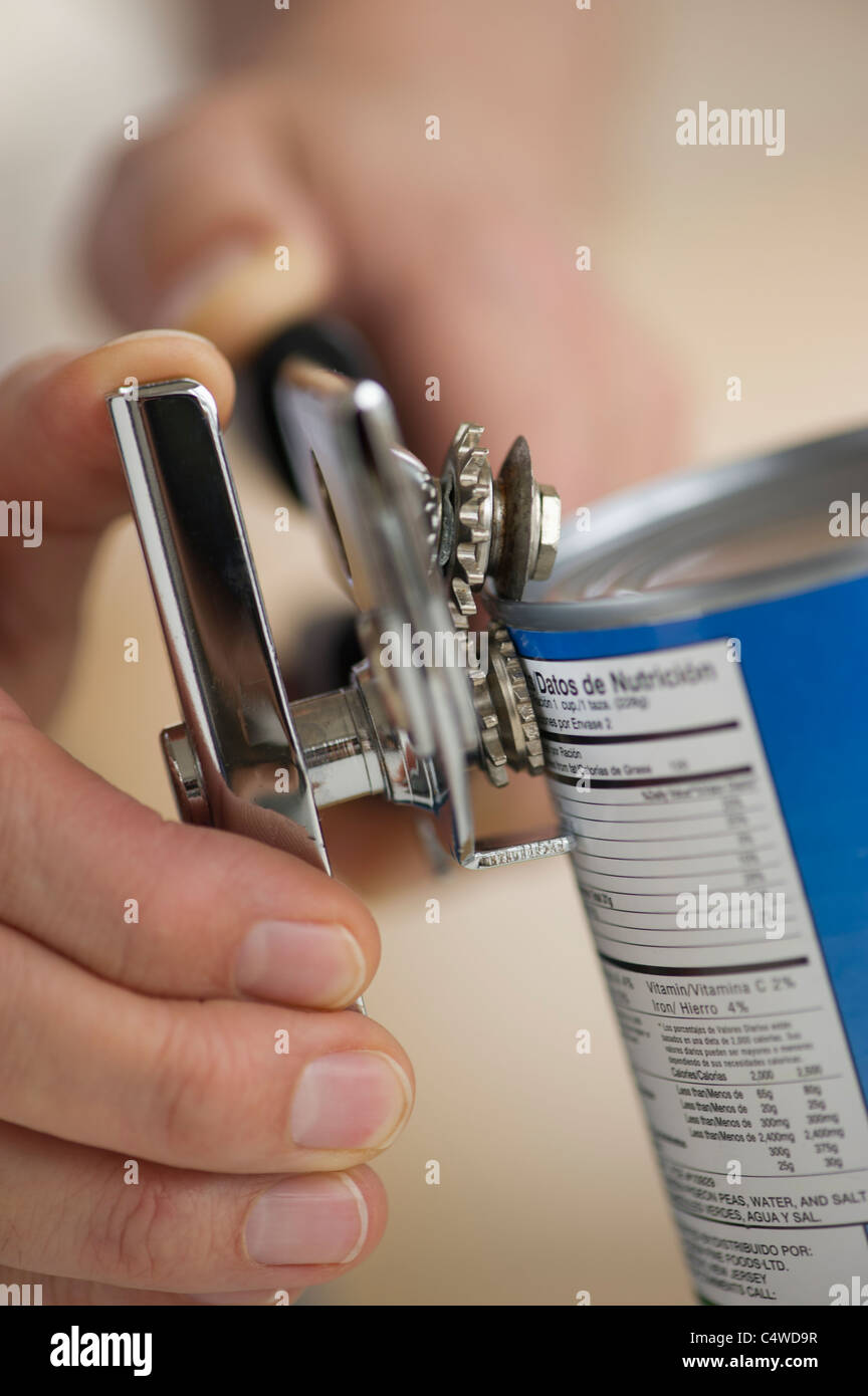 Man opening can Stock Photo - Alamy