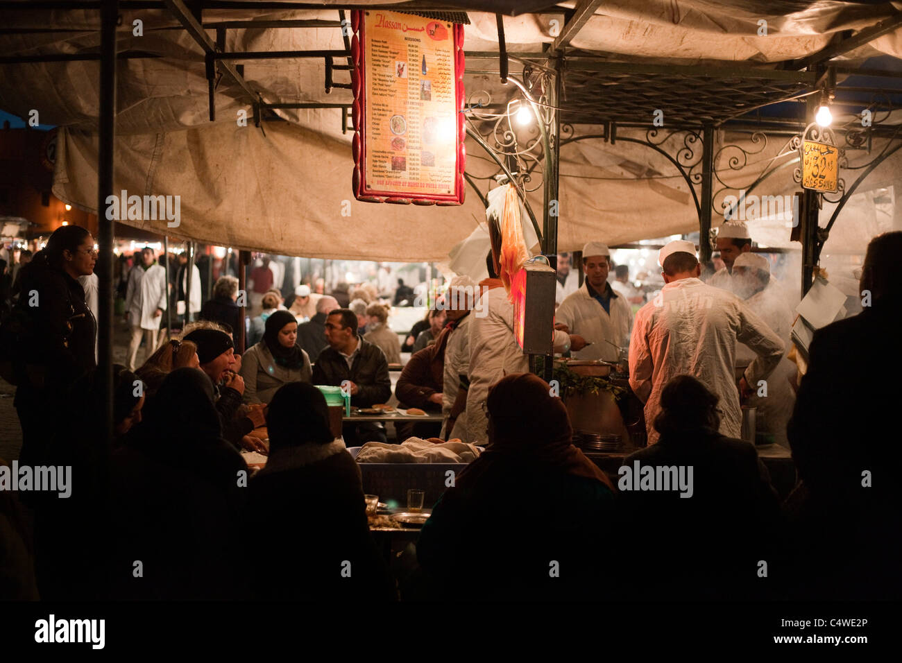 The hustle and bustle of the Jemaa El Fna night market. Marrakech ...