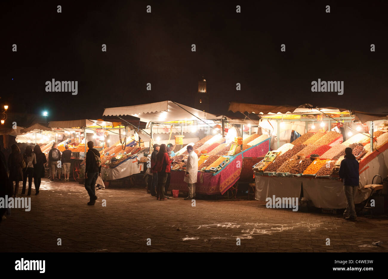 Dried fruit sellers in the Jemaa El Fna night market. Marrakech ...