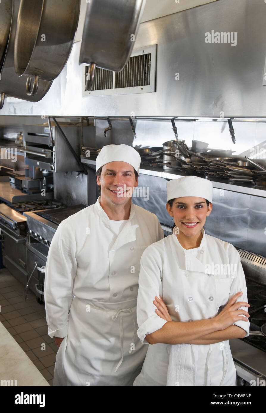 USA,New York,New York City,Chef and cook in commercial kitchen Stock ...