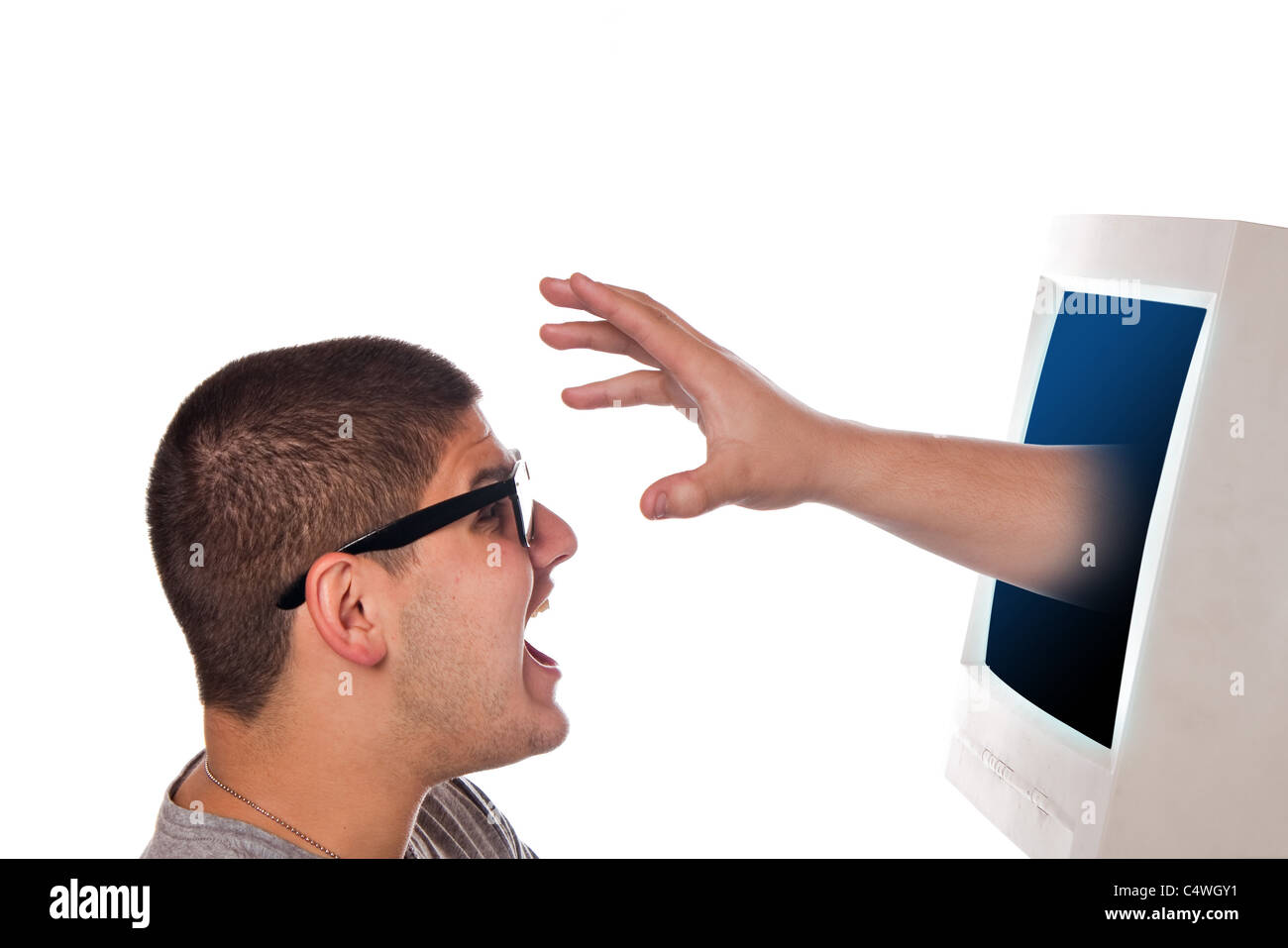 Hand reaching out computer monitor hi-res stock photography and images ...