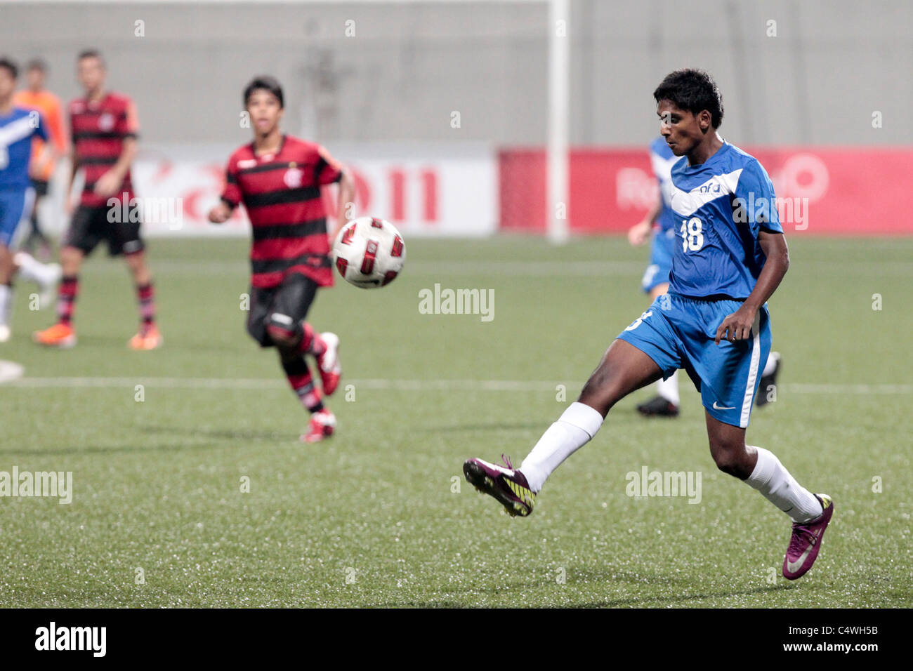 Faizal Raffi of Singapore U15 whips in a cross from the left flank ...