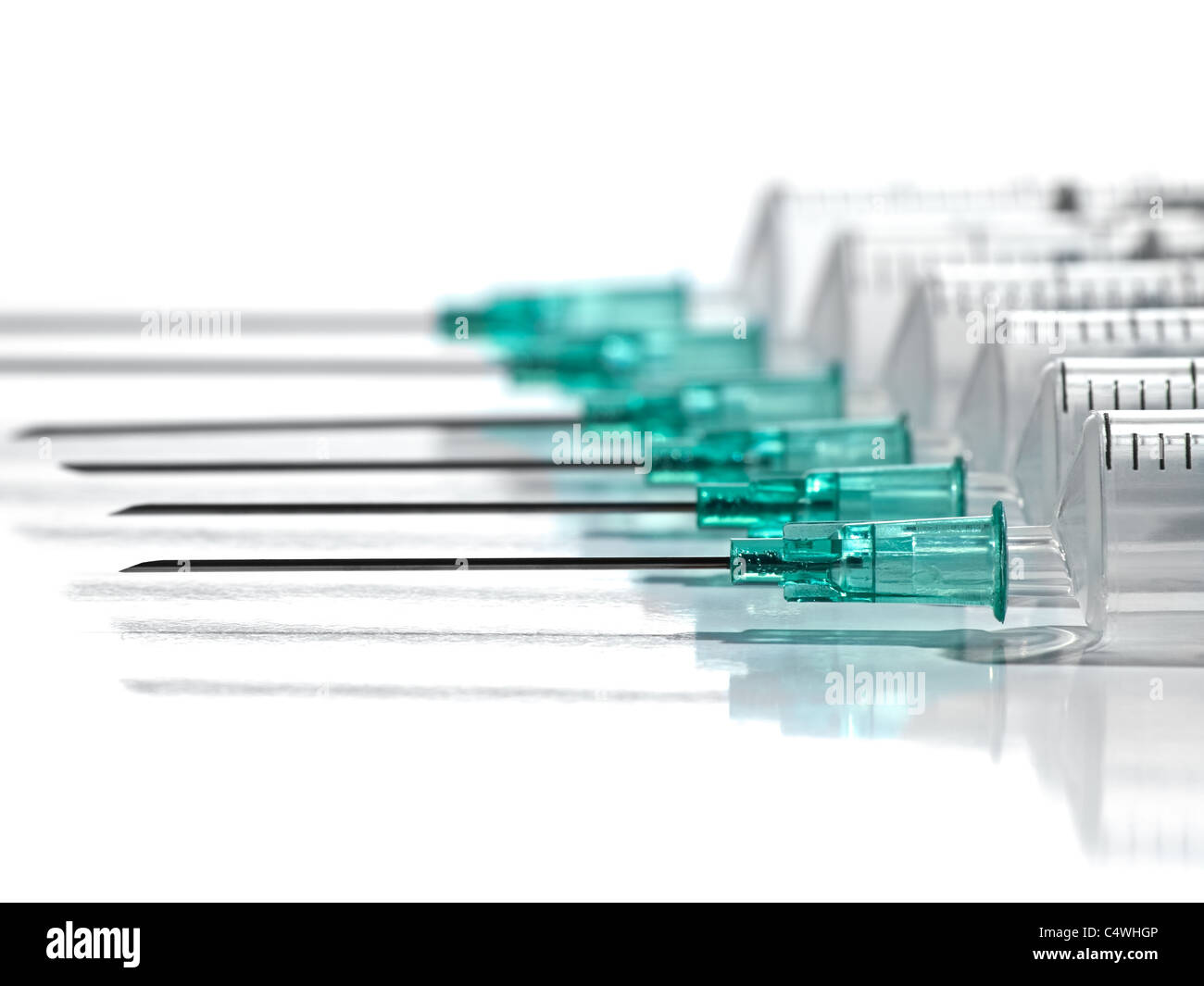 Row of syringes Stock Photo - Alamy