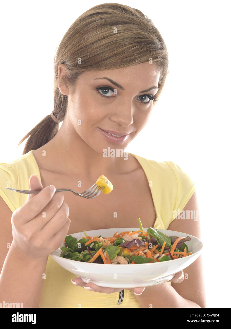 Young Woman Eating Salad. Model Released Stock Photo - Alamy