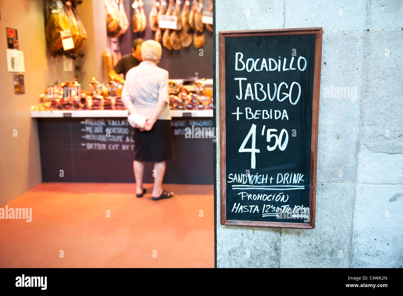 Food menu at a traditional Spanish food shop, La Boqueria Market ...