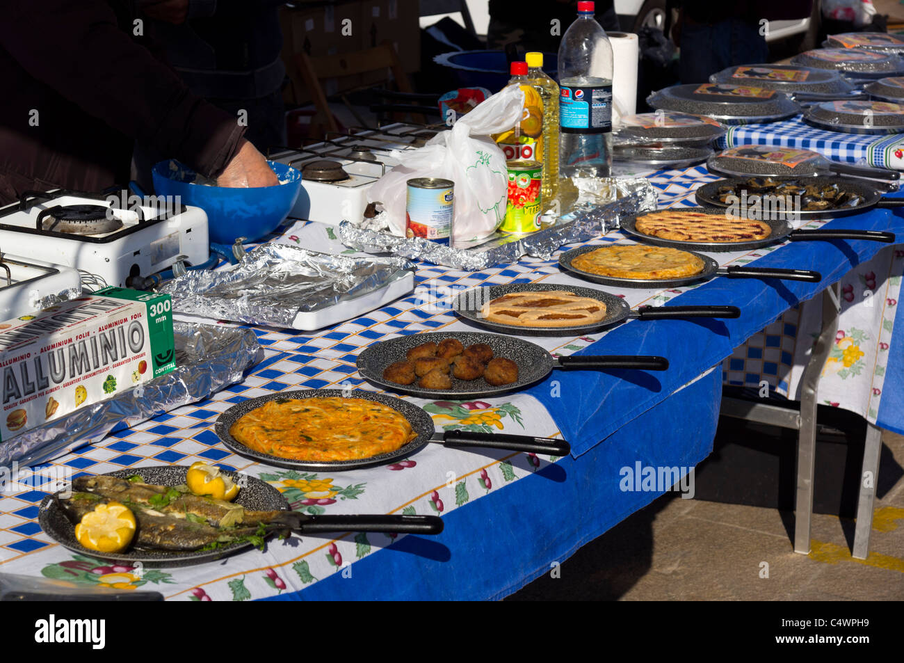 Italy - Taranto. Market day on the harbour quay. Stall selling a ...