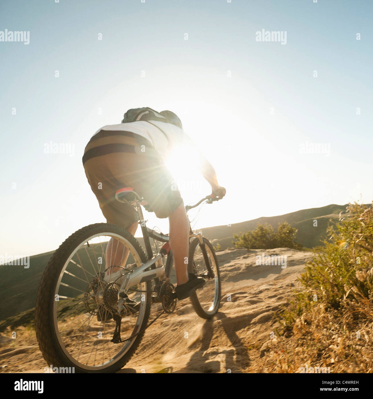 Cycling down steep hill hi-res stock photography and images - Alamy