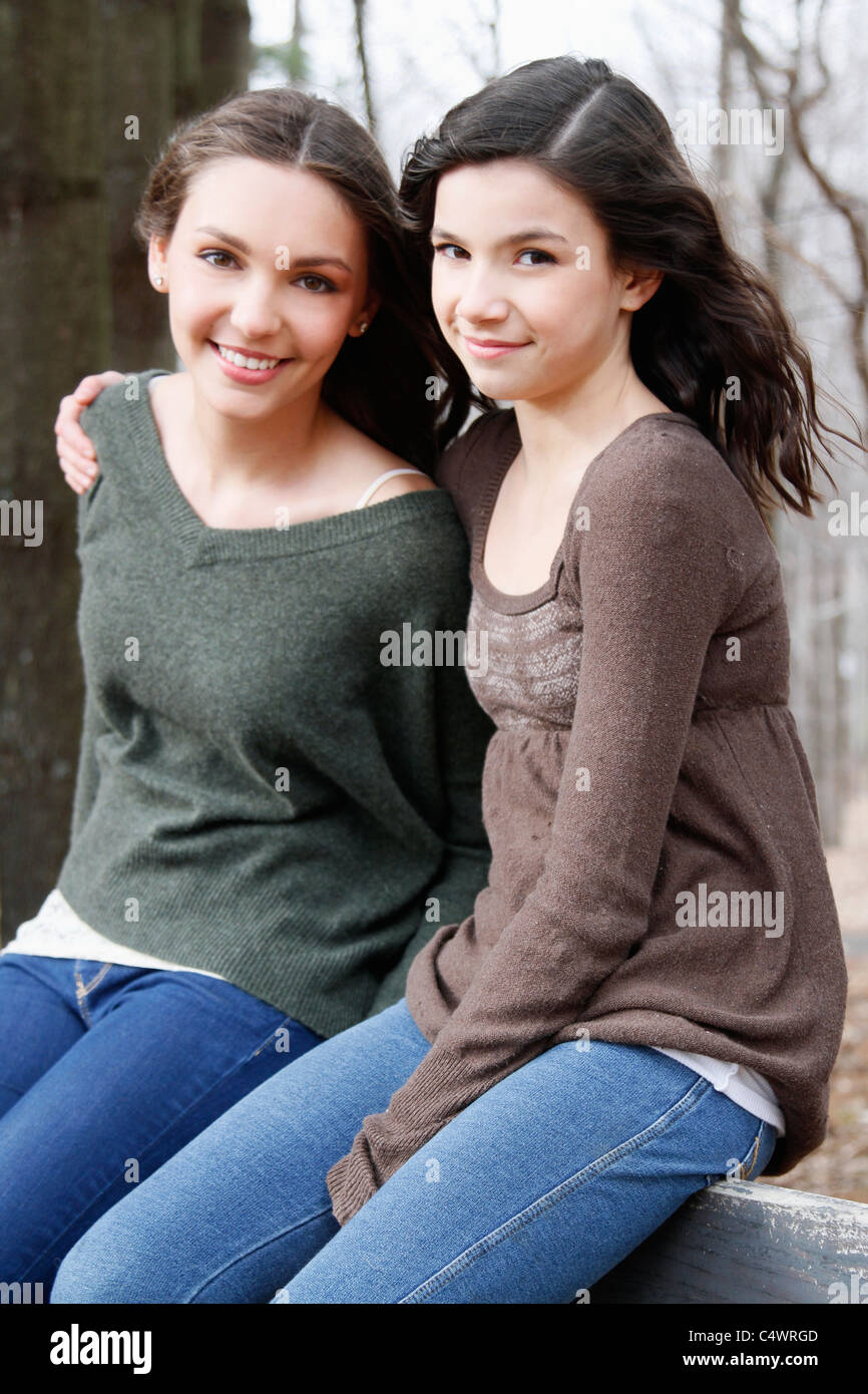 USA, New Jersey, Califon, Two teenage girls (16-17) sitting together ...