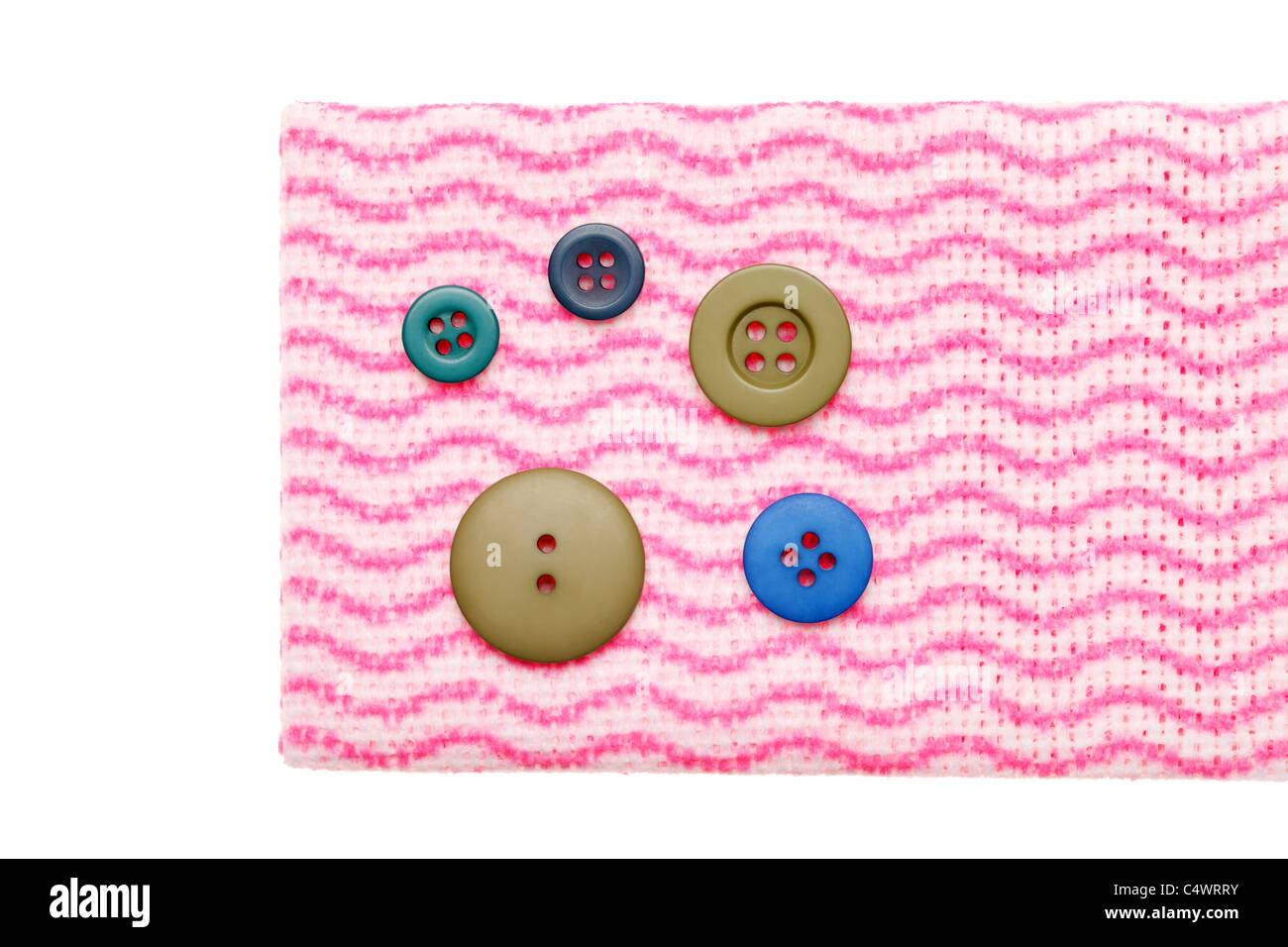 Buttons and cloth on a white Stock Photo - Alamy