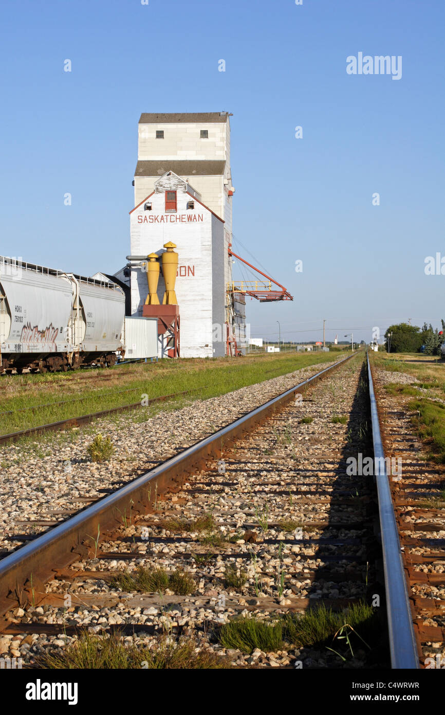 Grain elevator and railroad tracks in Watson, Saskatchewan Stock Photo ...