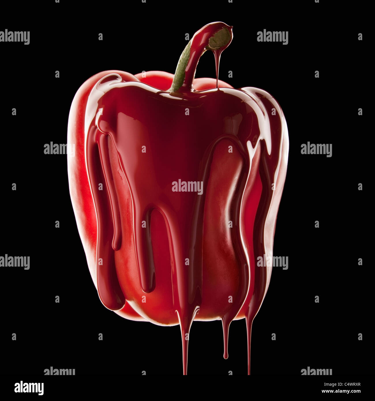 Studio shot of red bell pepper covered with red paint Stock Photo - Alamy