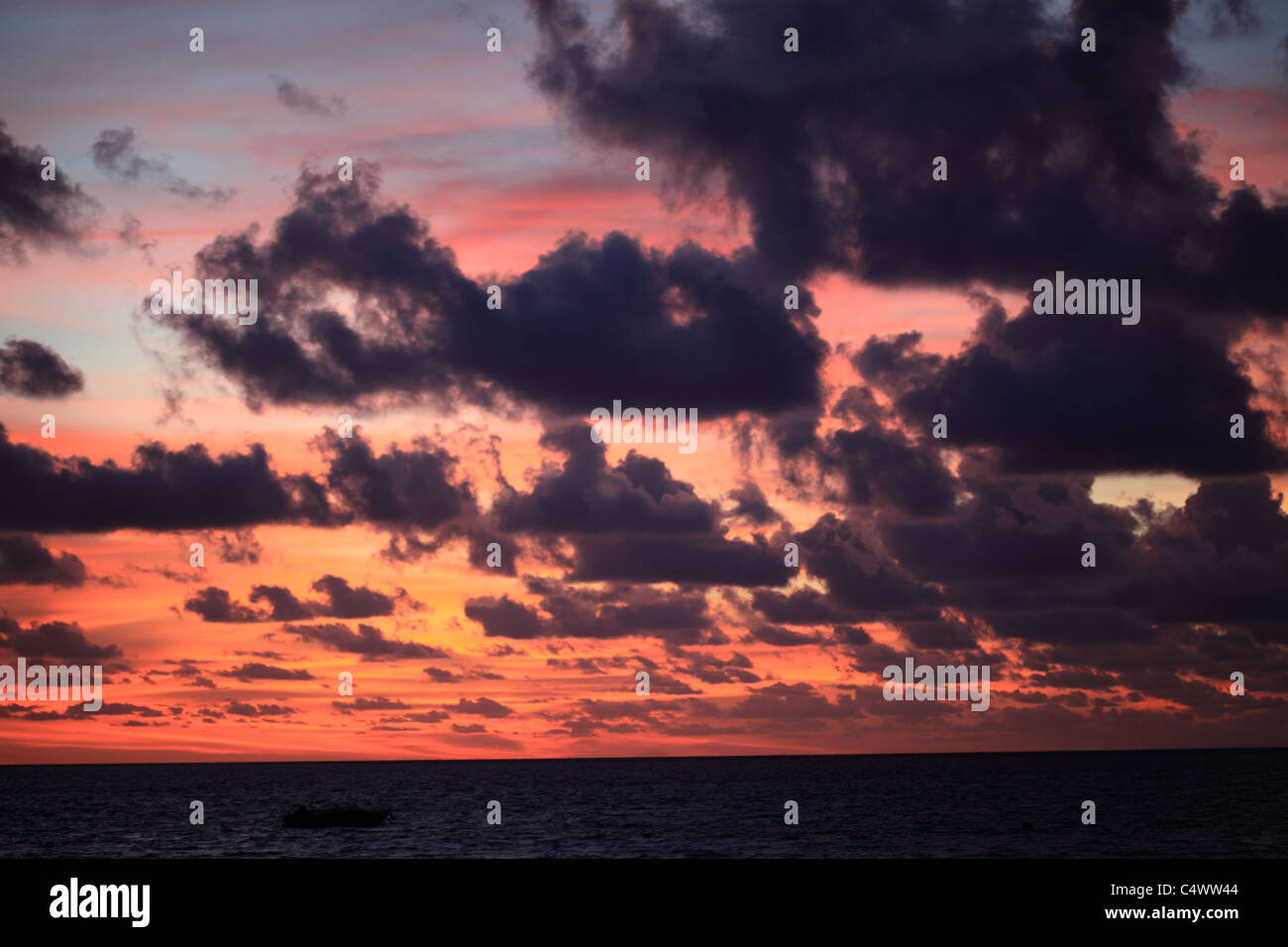 Dramatic Sunset lit in the Maldives Stock Photo - Alamy